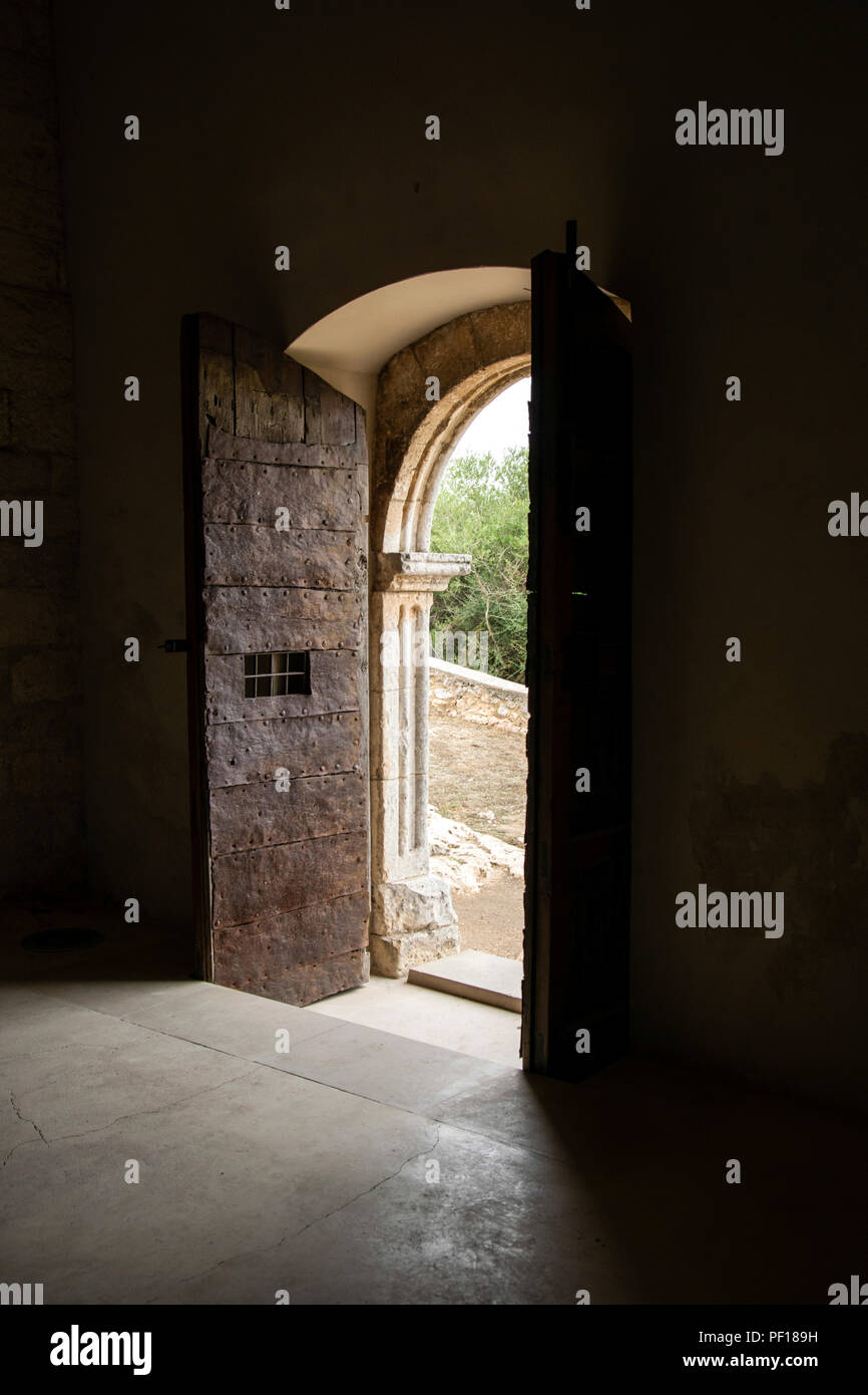Interior of a church with old open doors Stock Photo - Alamy