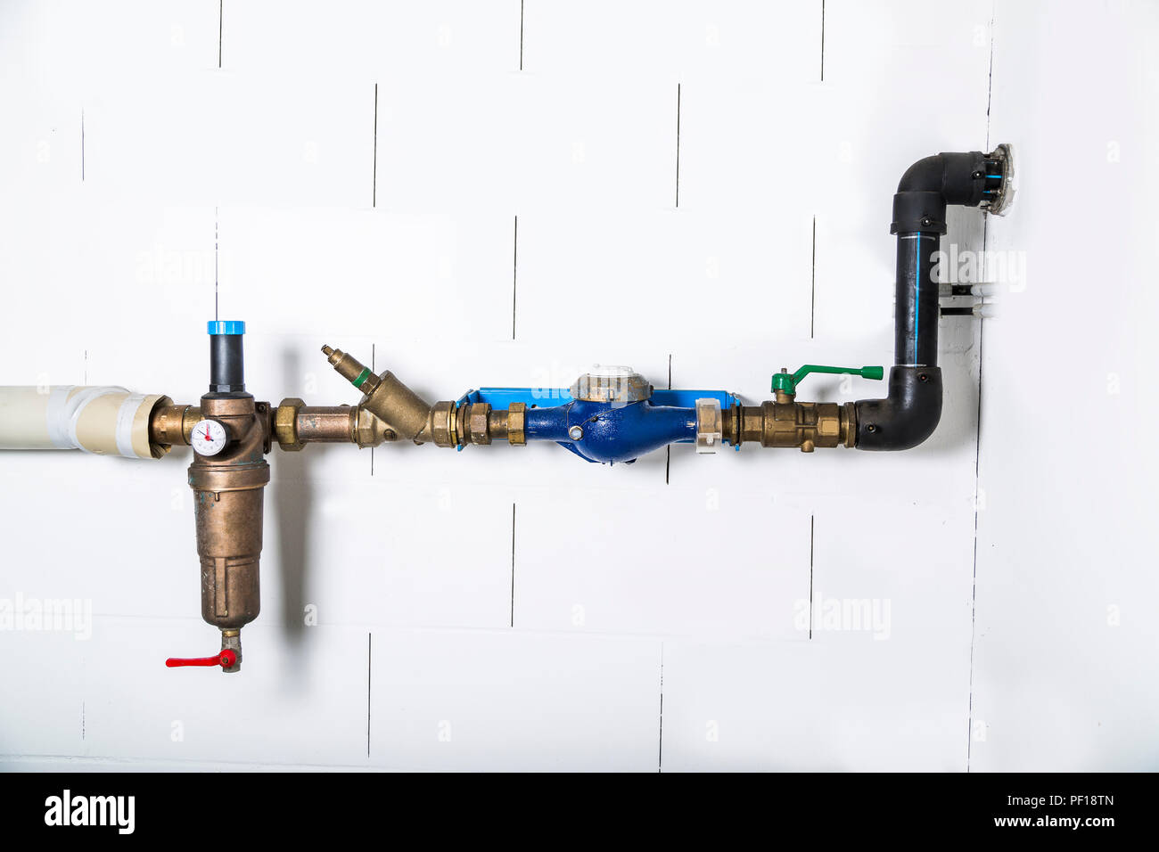 Water meter or manometer on metallic rusty water pipe Stock Photo - Alamy