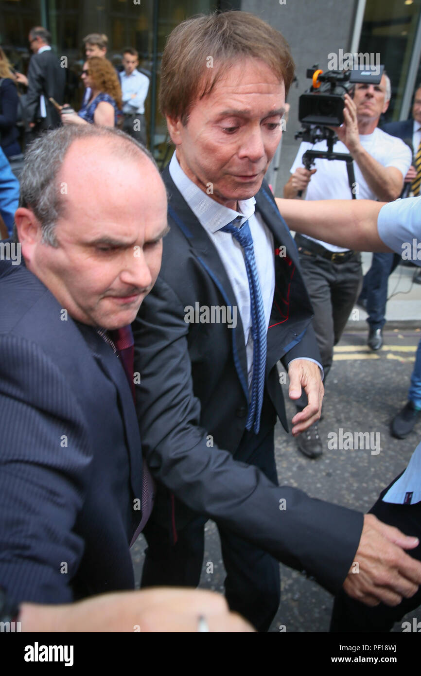 An emotional looking Cliff Richard speaking to the media after winning ...