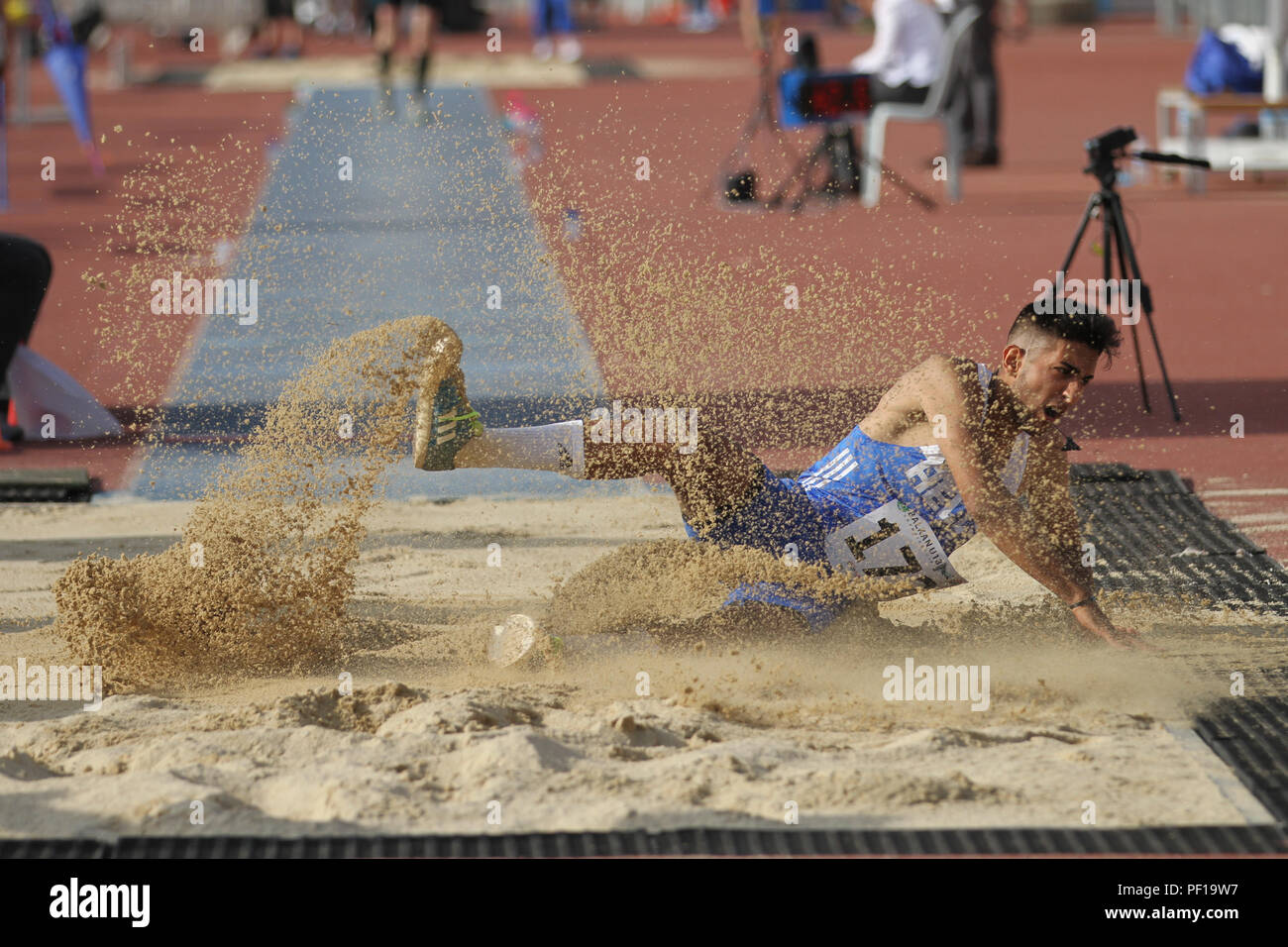 ISTANBUL, TURKEY - JUNE 09, 2018: Undefined athlete long jumping during ...