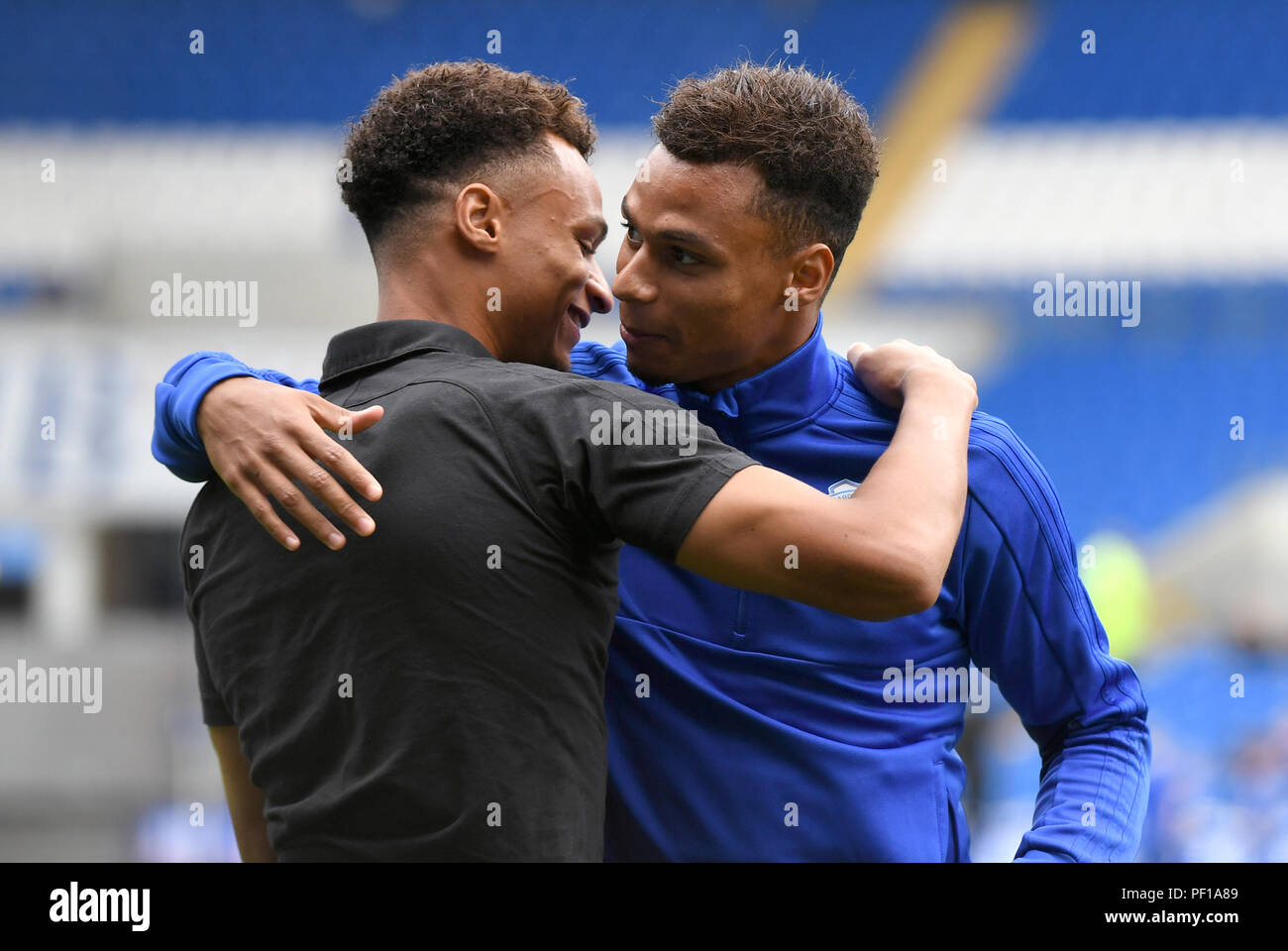 Cardiff City's Josh Murphy (right) greets twin brother Newcastle United ...