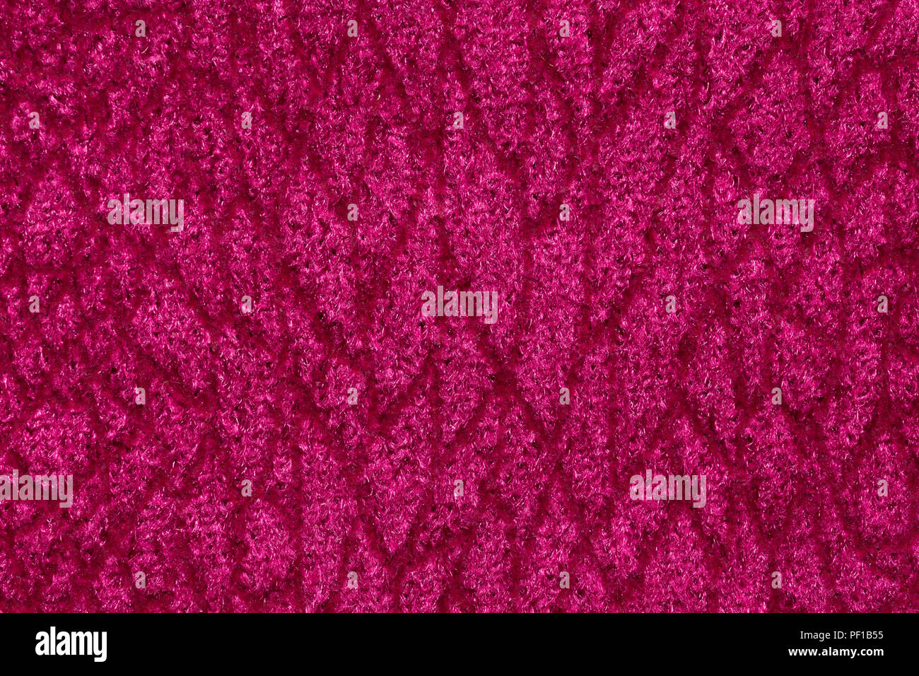 Saturated pink fabric texture with ornament on macro. High resolution ...