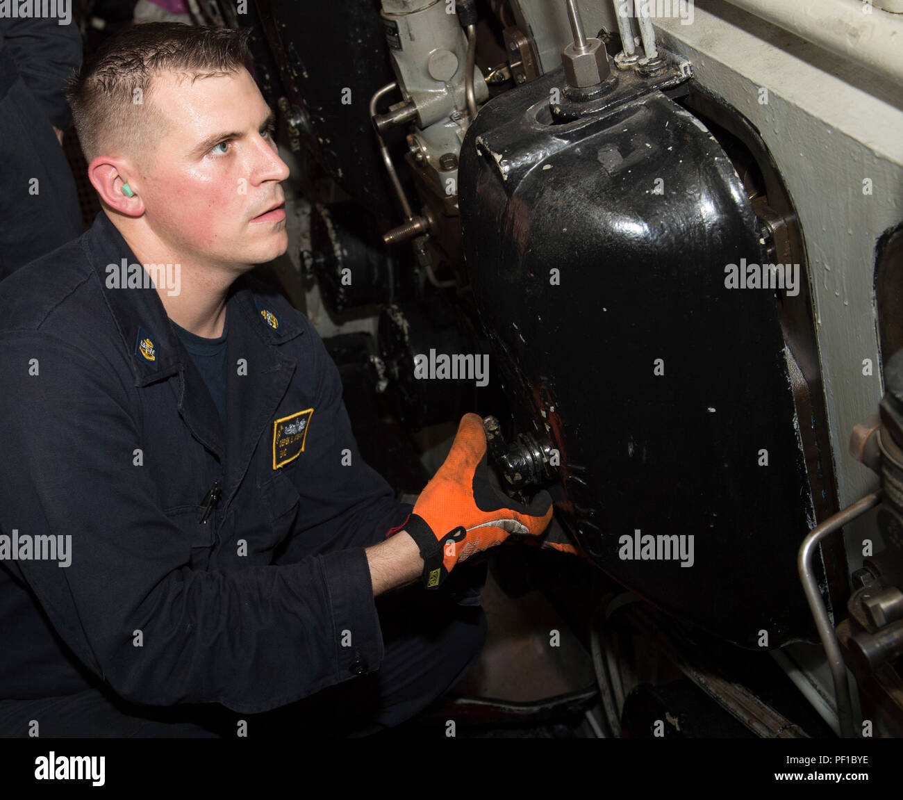 160221-N-YR245-053 PACIFIC OCEAN (Feb. 21, 2016) Chief Engineman Derek ...