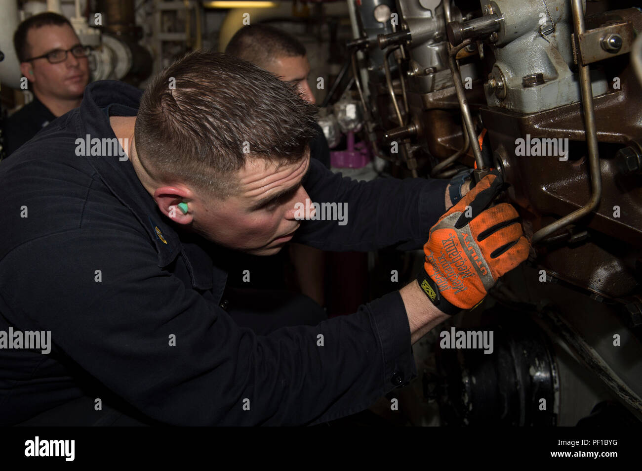 160221-N-YR245-056 PACIFIC OCEAN (Feb. 21, 2016) Chief Engineman Derek ...