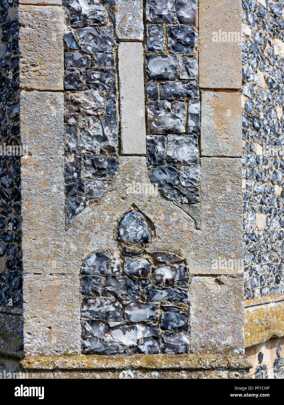 Details of knapped flint and stone church walls Stock Photo - Alamy