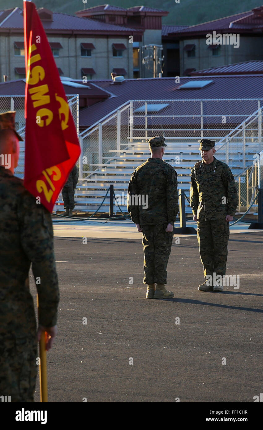 Sgt. Roberto J. Perez, center, stands at attention before receiving the ...