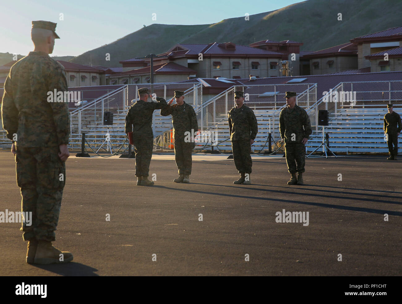 Sgt. Roberto J. Perez, left, salutes Lt. Gen. David H. Berger after ...