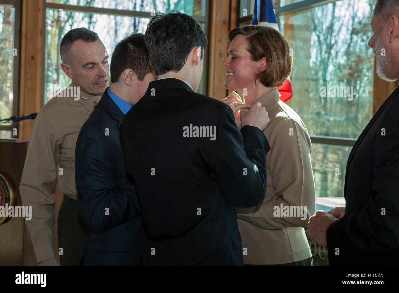 Todd Hunt Jr., center, and Jonathan Hunt, sons of U.S. Marine Corps Lt ...