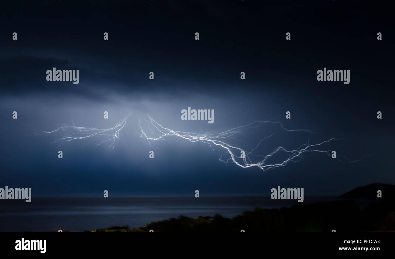 lightning and storm on the sea at night Stock Photo - Alamy