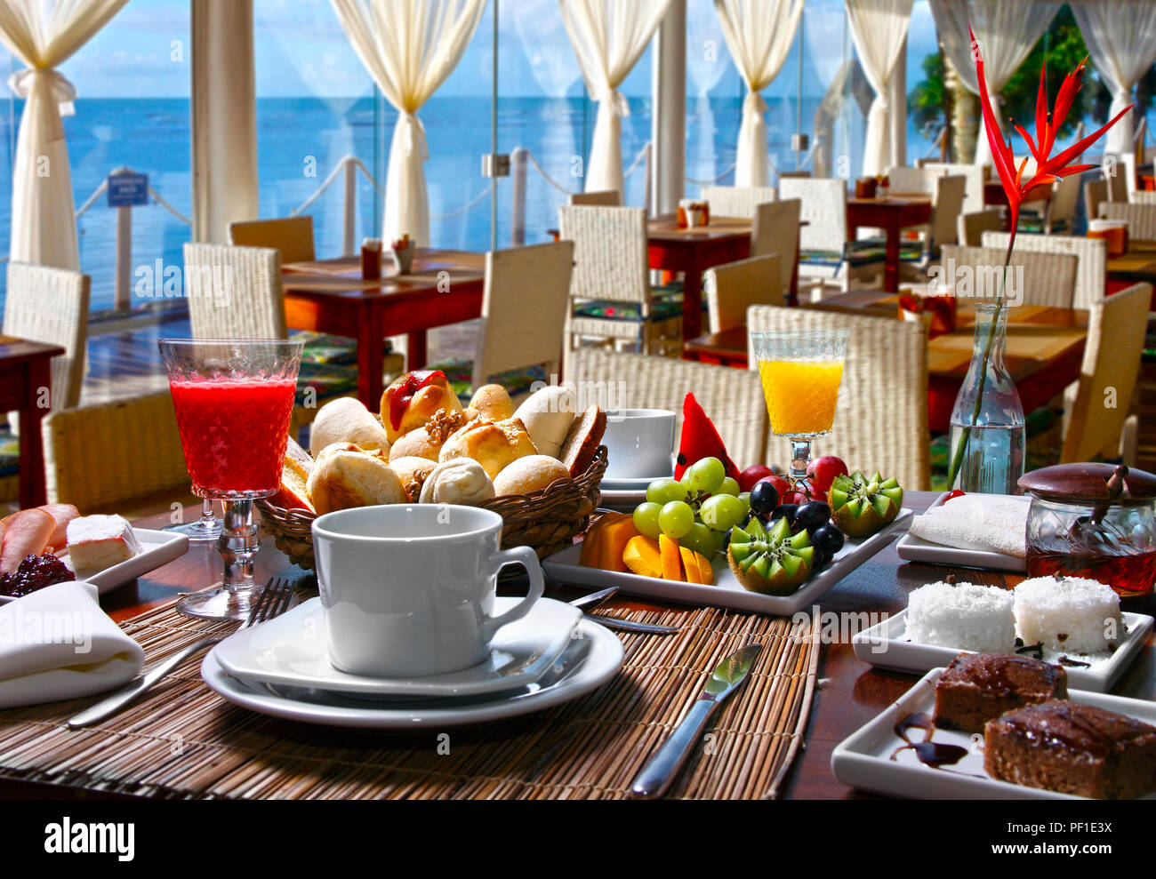 Breakfast at the hotel on the beach Stock Photo - Alamy