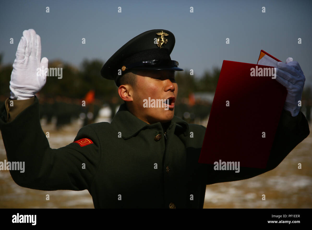 A Marine adjutant with the Republic of Korea (ROK) recites an adjutant ...
