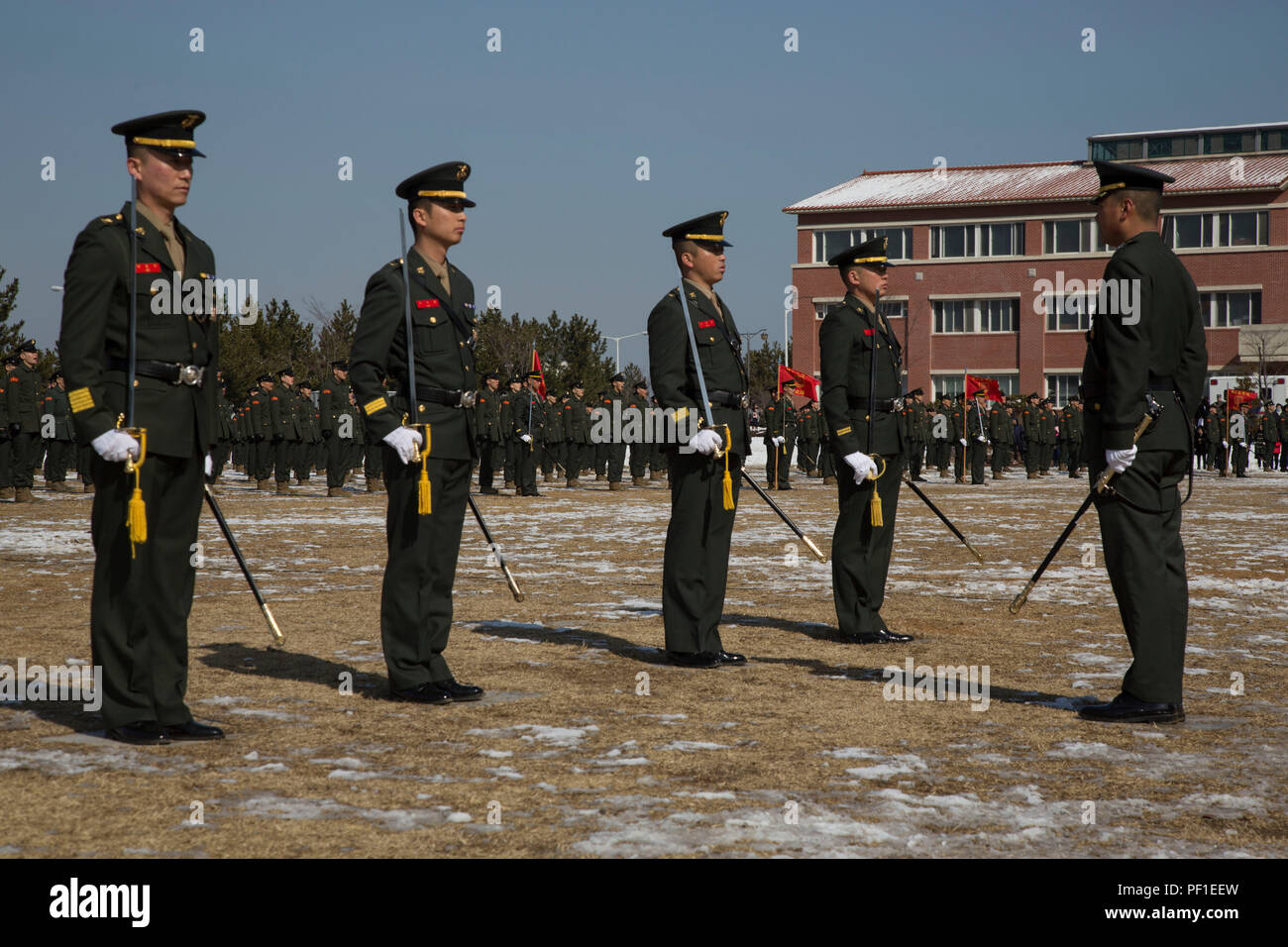 The staff comprised of Republic of Korea (ROK) Marines stand at the ...