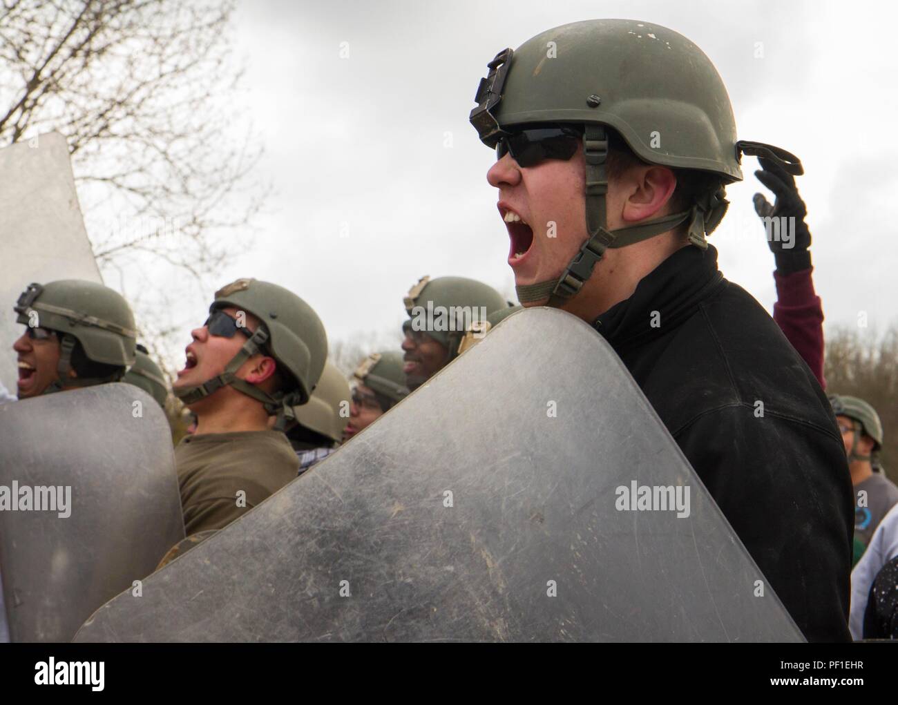 A protestor taunts U.S. Army Soldiers from the 1st Battalion, 41st ...