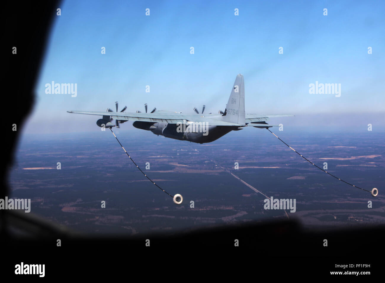 A KC-130J Super Hercules conducts aerial refueling missions during ...