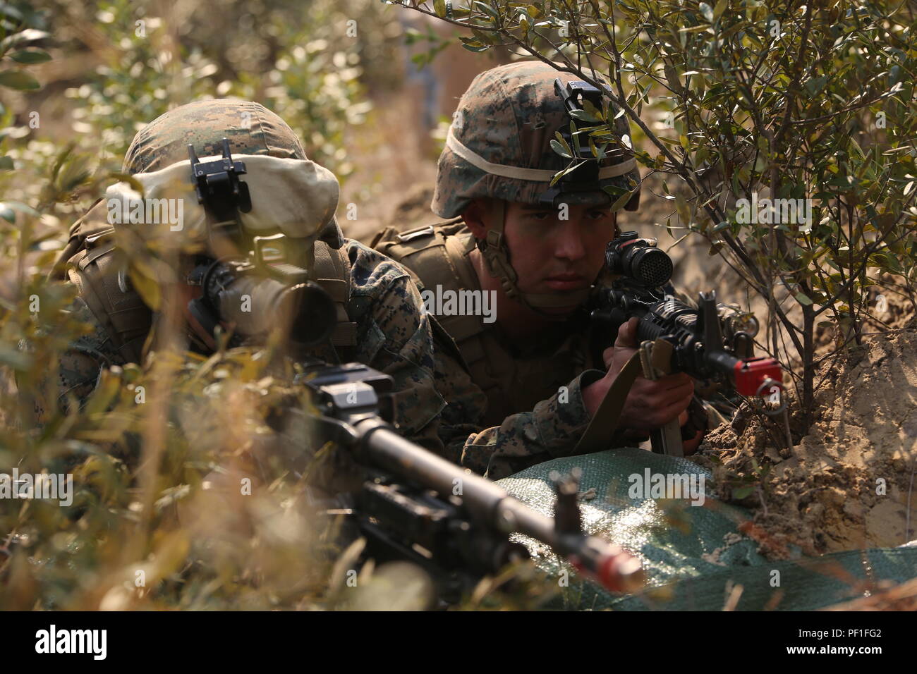 Marines with 3rd Battalion, 6th Marine Regiment, secure defensive ...