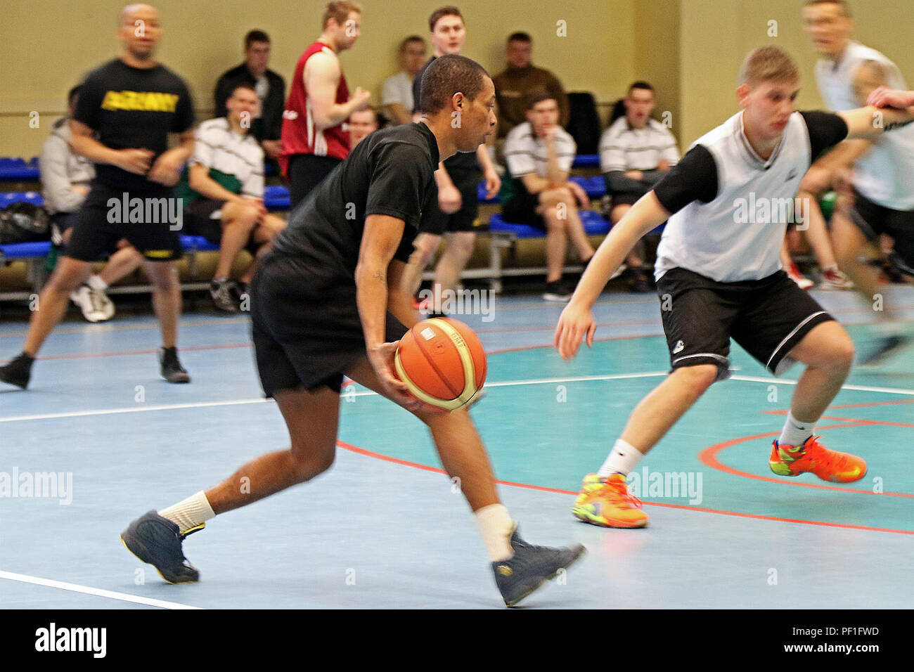 Spc. Darron Harris (left), an indirect fire infantryman assigned to ...