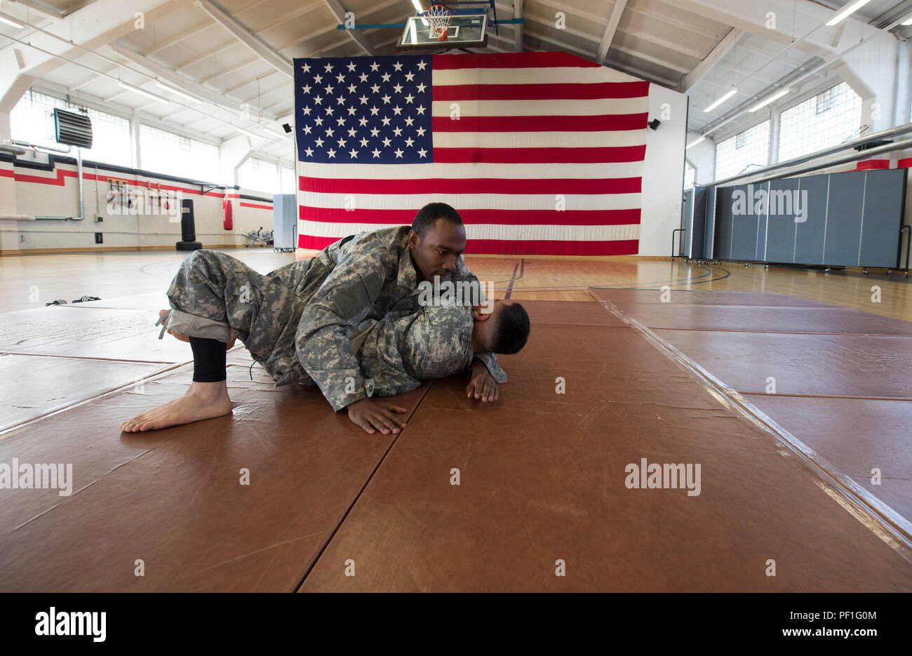 Two competitors practice combative maneuvers during the U.S. Army ...