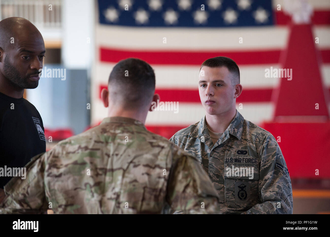 U.S. Air Force Airman 1st Class Robert Ward (right), an Airman with the ...