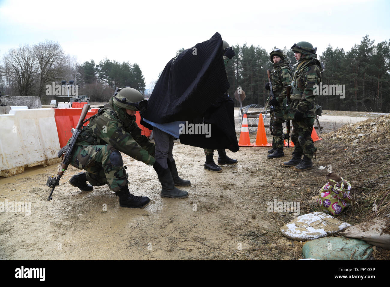 A Moldovan soldier of Moldovan Military Academy conducts a personnel ...
