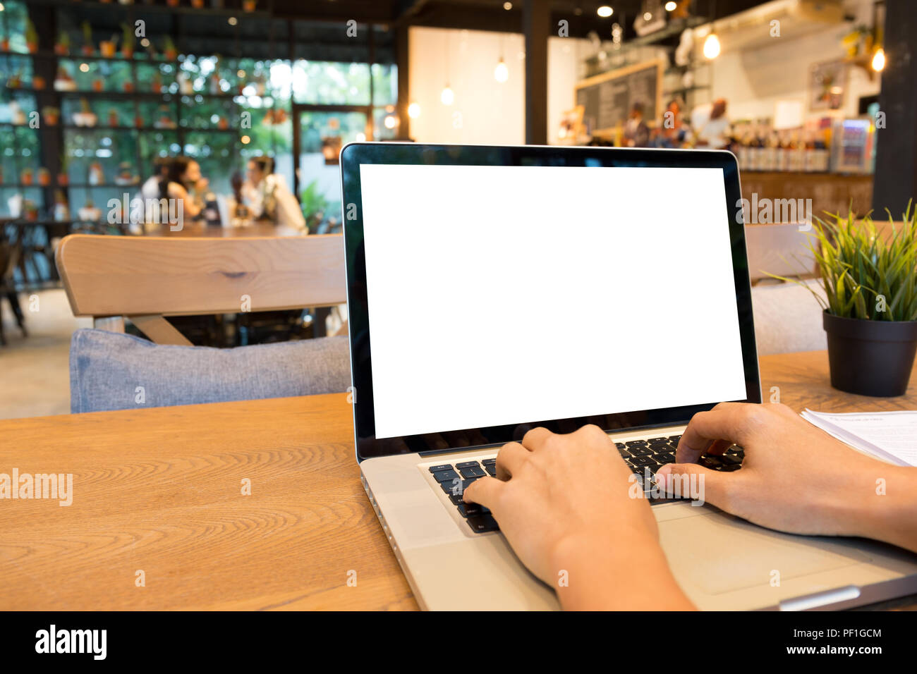 Business working hand using laptop computer on table Stock Photo - Alamy