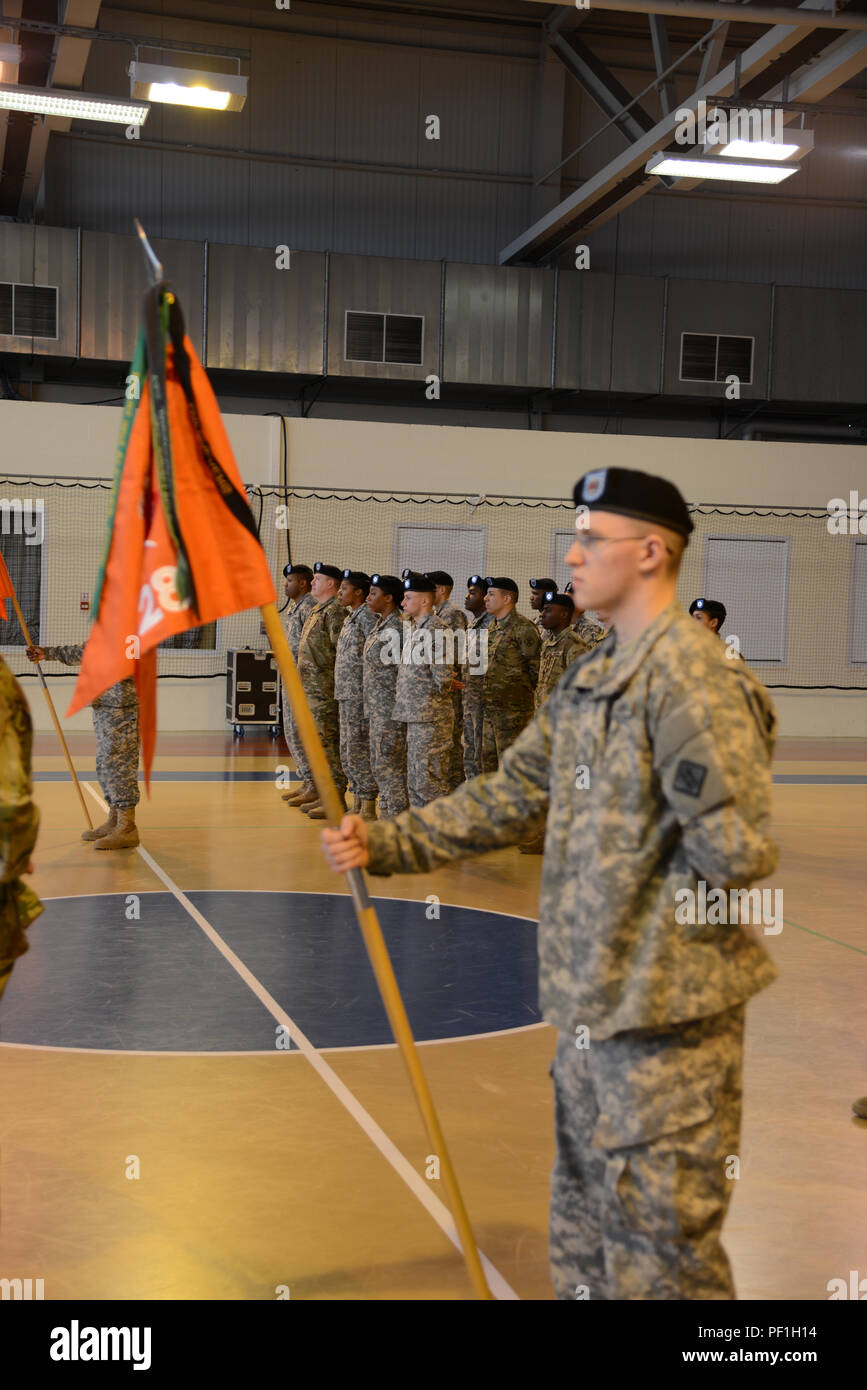 U.S. Army Pvt. Anthony Utphall holds the 128th Signal Company's guidon ...