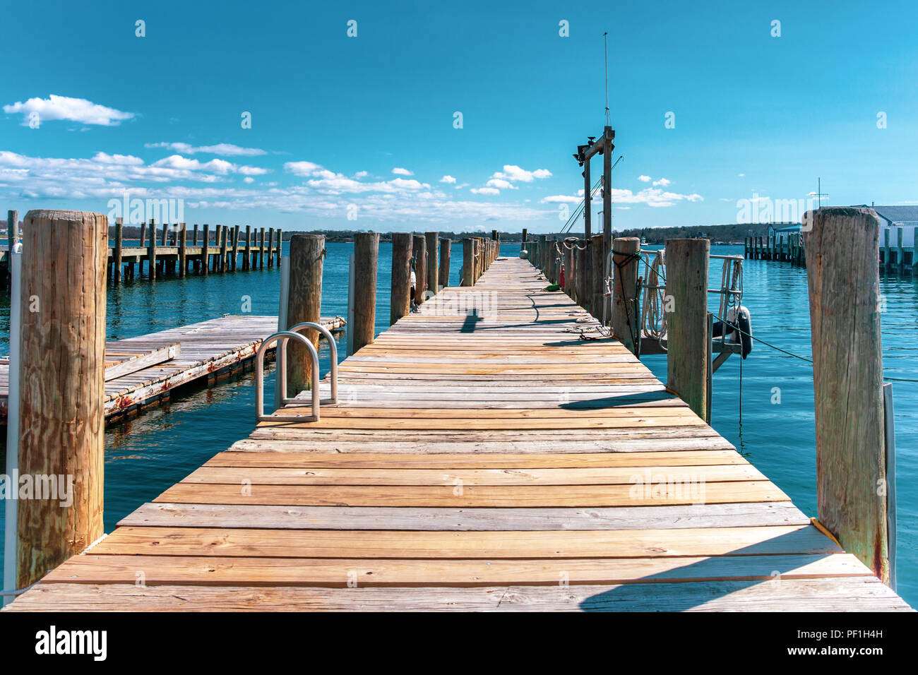 Wooden dock or pier by the lake in turquoise sky and white cloud Stock ...
