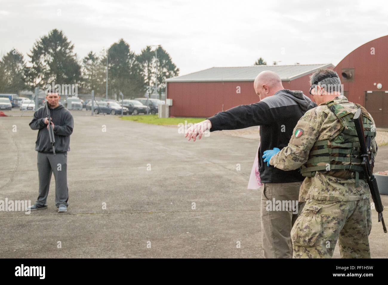 U.S. Air Force Staff Sgt. Jarrett Reeder, left, assigned to the 424th ...