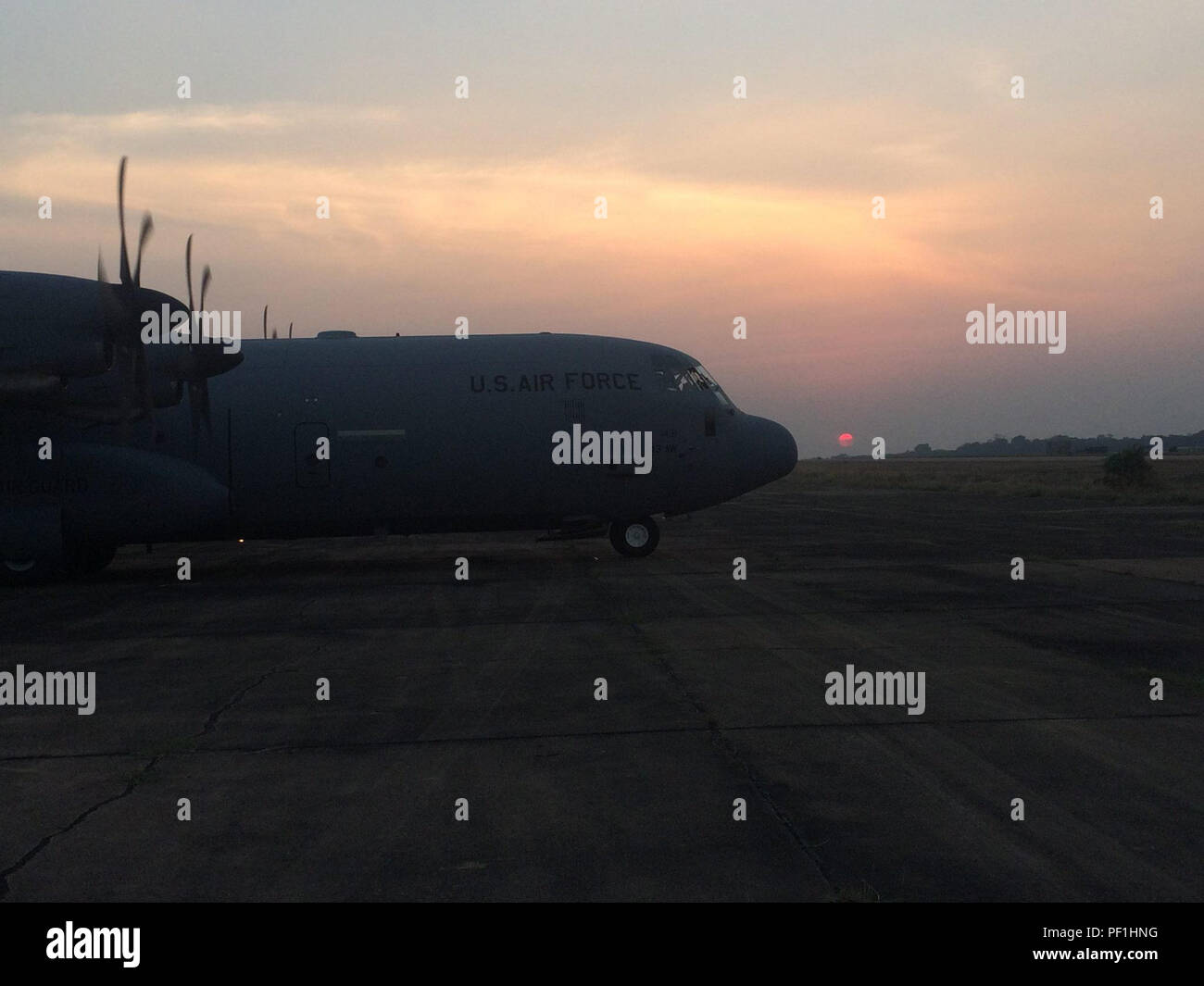 A 143d Airlift Wing C-130J Super Hercules sits on the ramp in Thailand ...