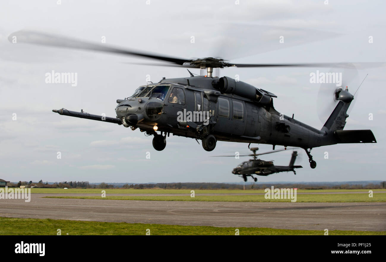 An HH-60G Pave Hawk from the 56th Rescue Squadron and a British Army AH ...