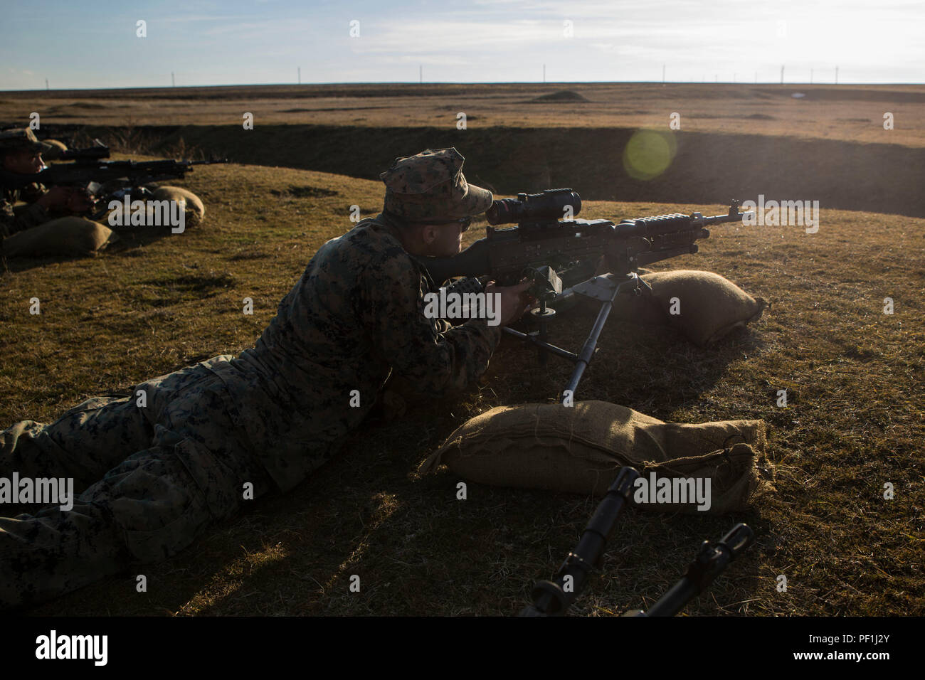 U.S. Marines with Black Sea Rotational Force fire M240B light machine ...