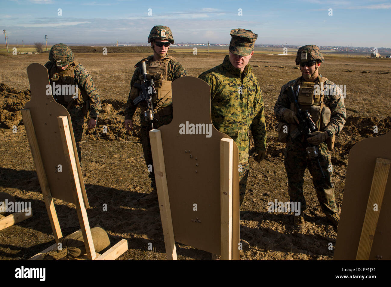 U.S. Marines with Black Sea Rotational Force check their targets during ...