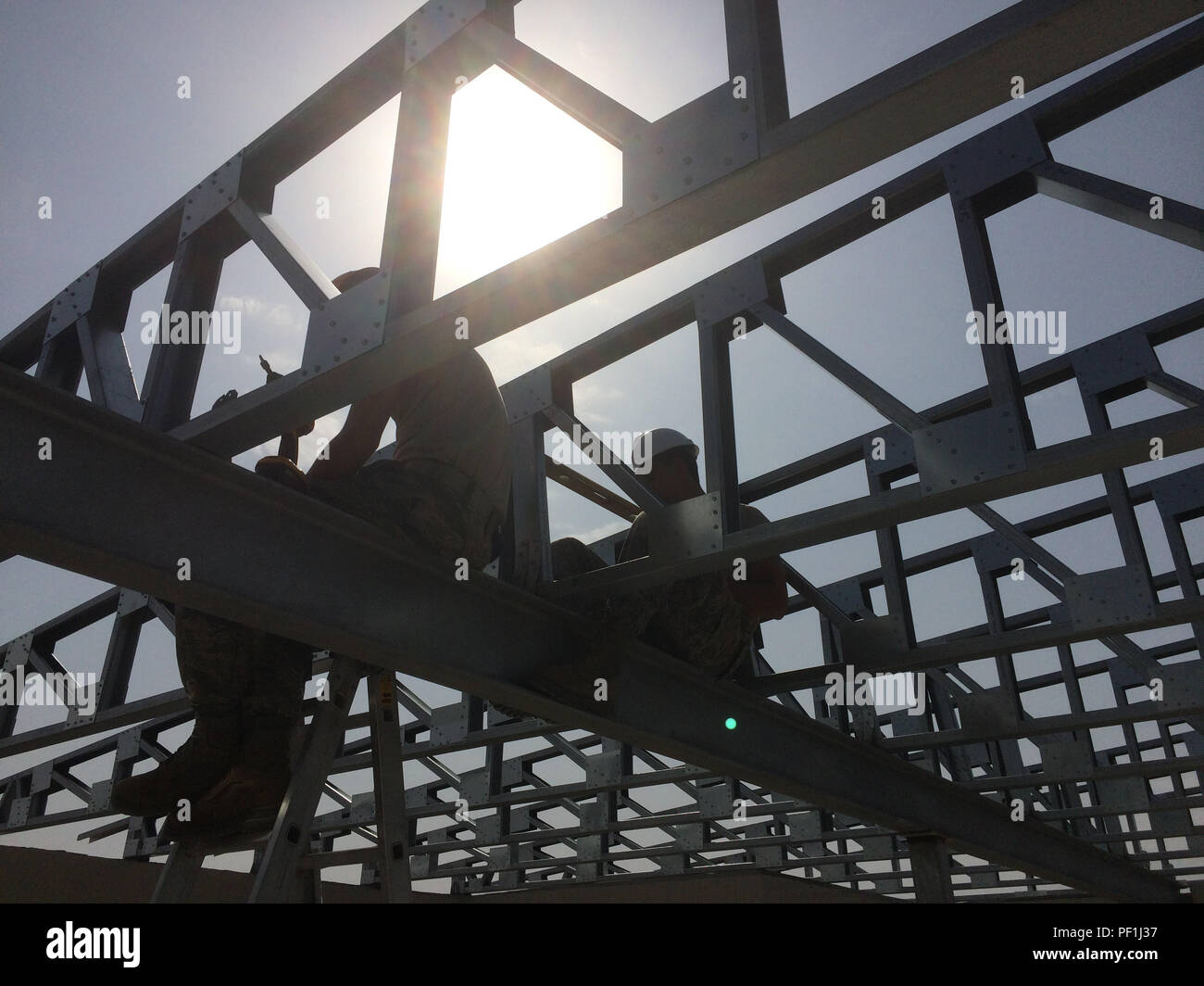 Civil engineers from 126th Air Refueling Wing work along side members ...