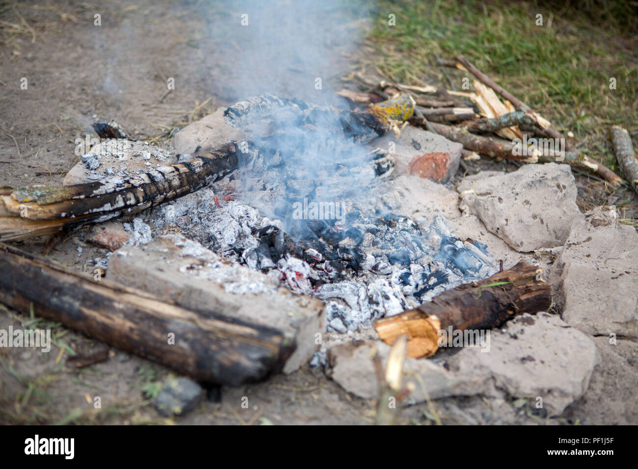 Smoldering Campfire Stock Photos & Smoldering Campfire Stock Images - Alamy
