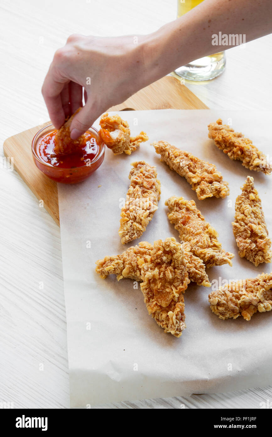 Chicken tenders dipping hi-res stock photography and images - Alamy