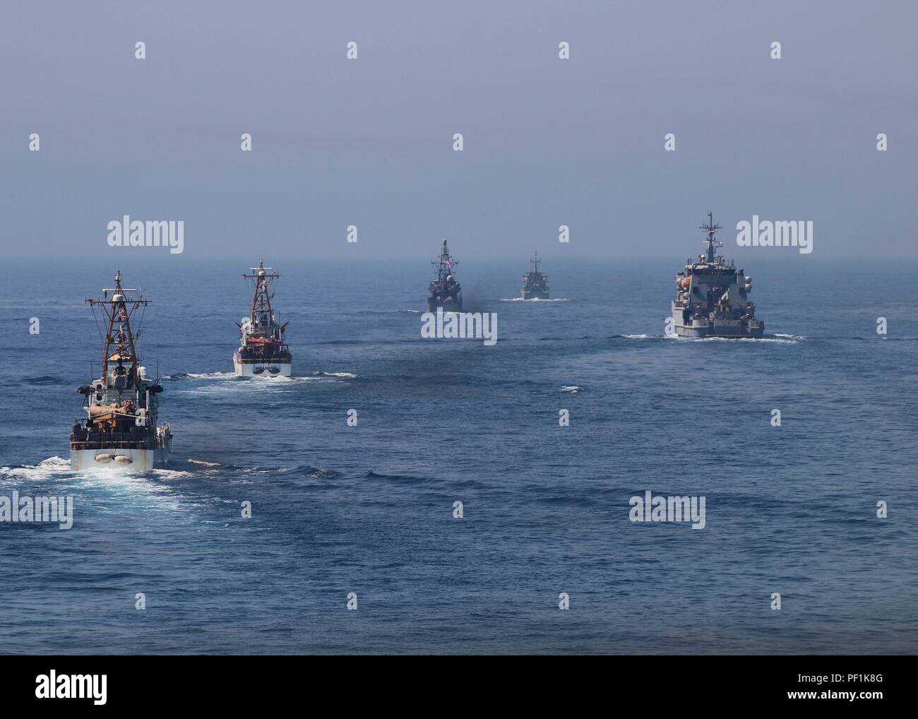 160815-N-GP524-355 ARABIAN GULF (Aug. 15, 2016) From left to right, the ...