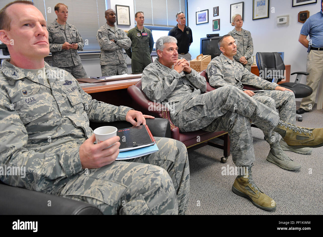 Col. Darren Cole, 305th Air Mobility Wing commander, sits with Lt. Gen ...