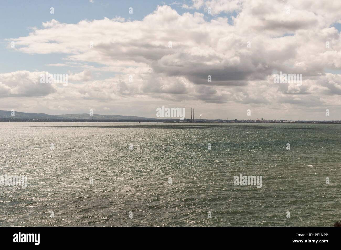 Sea and sky with Dublin in the background Stock Photo - Alamy