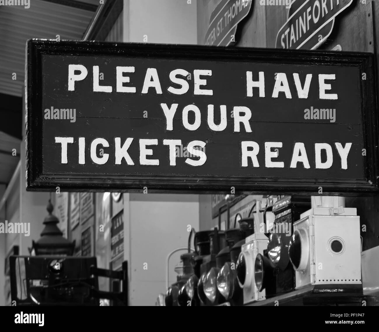 A 'tickets ready' sign, with historic railway lamps at the Ingrow rail ...