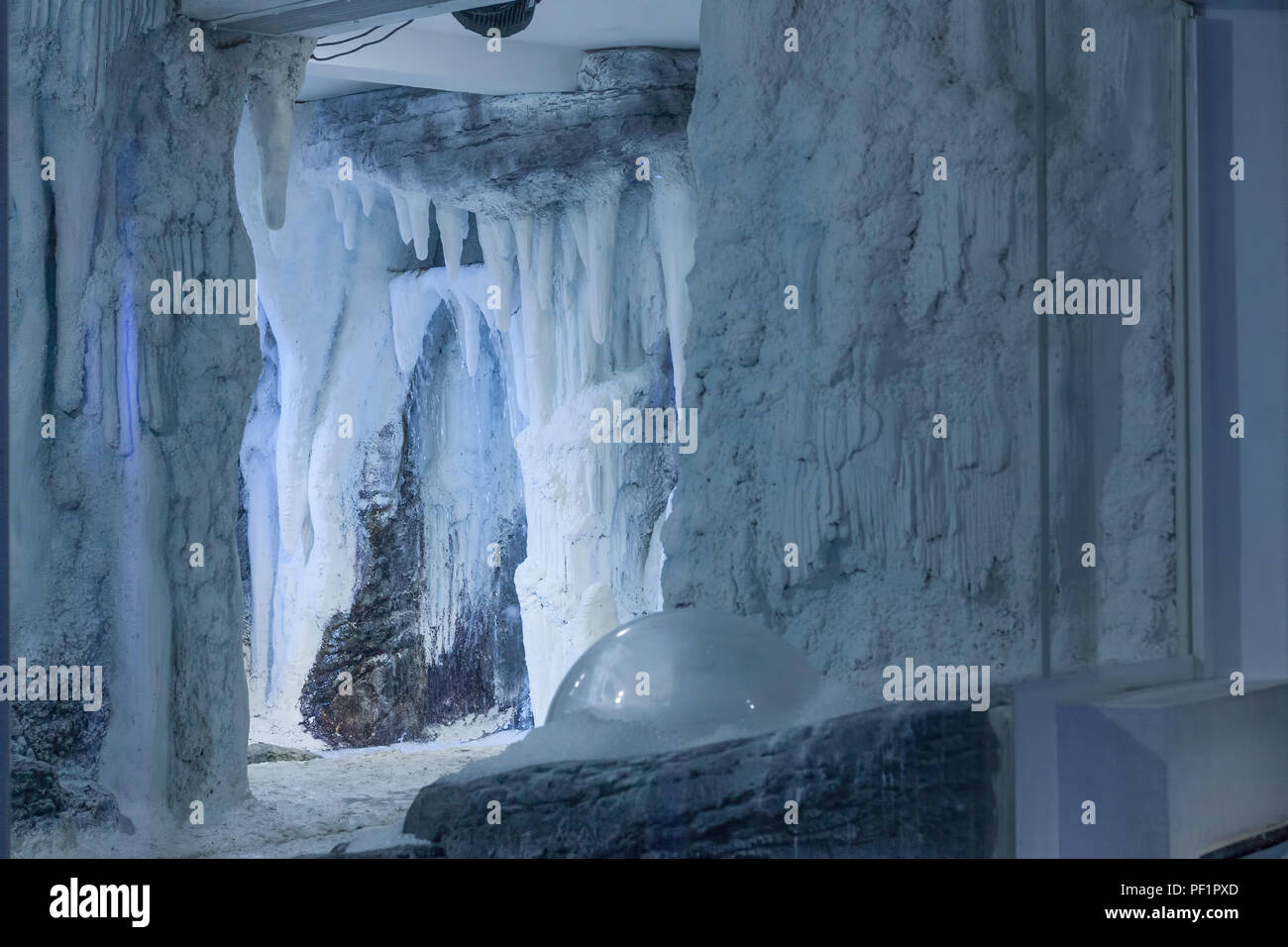 Frozen zone of aquarium, icy landscape, where you can view penguins at ...