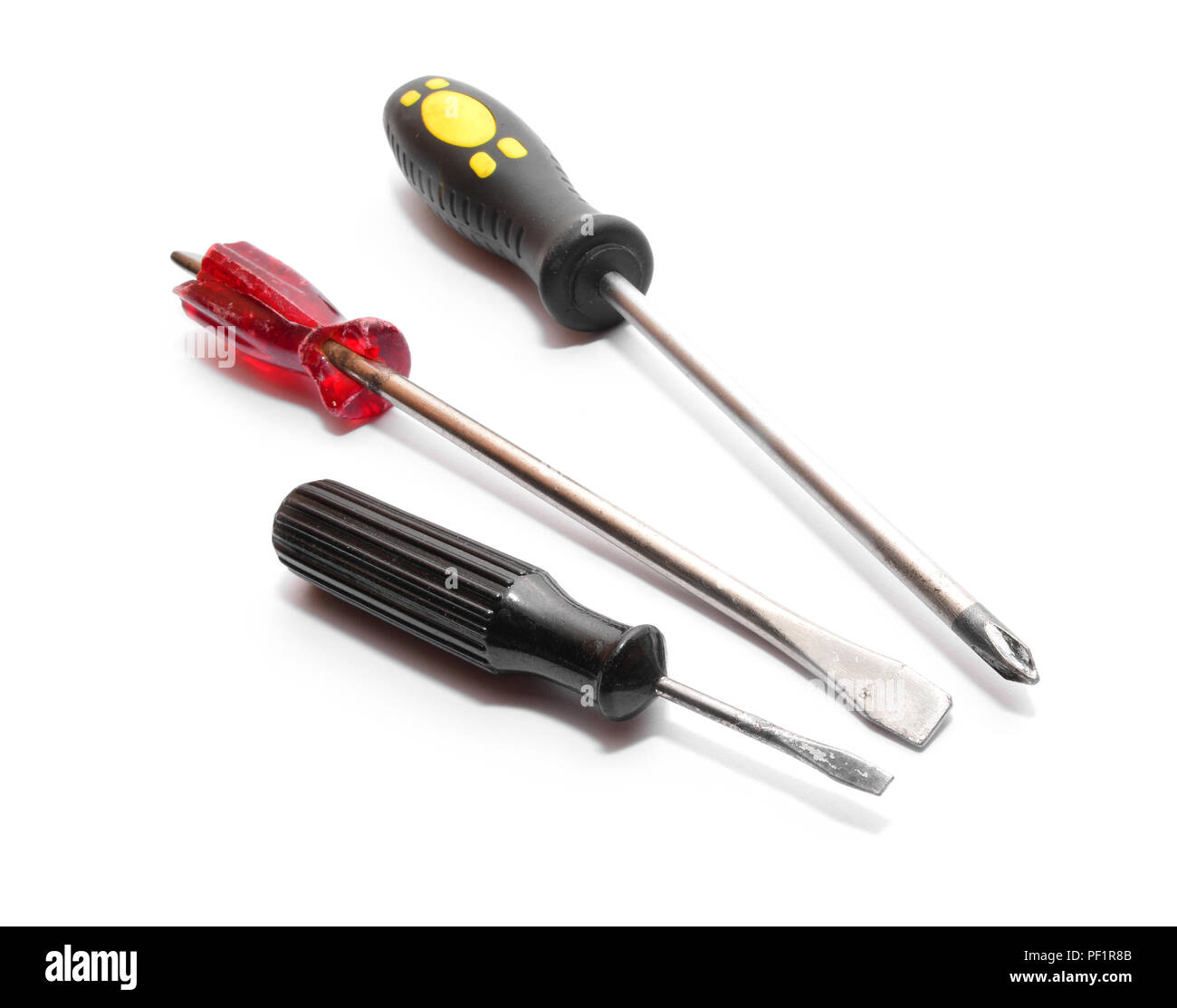 three screwdrivers isolated on white Stock Photo - Alamy