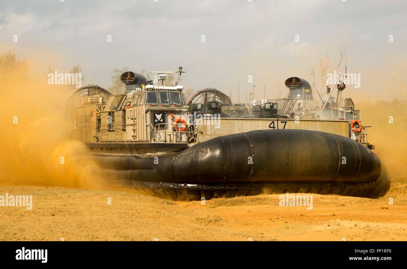 Landing Craft Air Cushioned 47 prepares to deflate on Kin Blue Beach ...