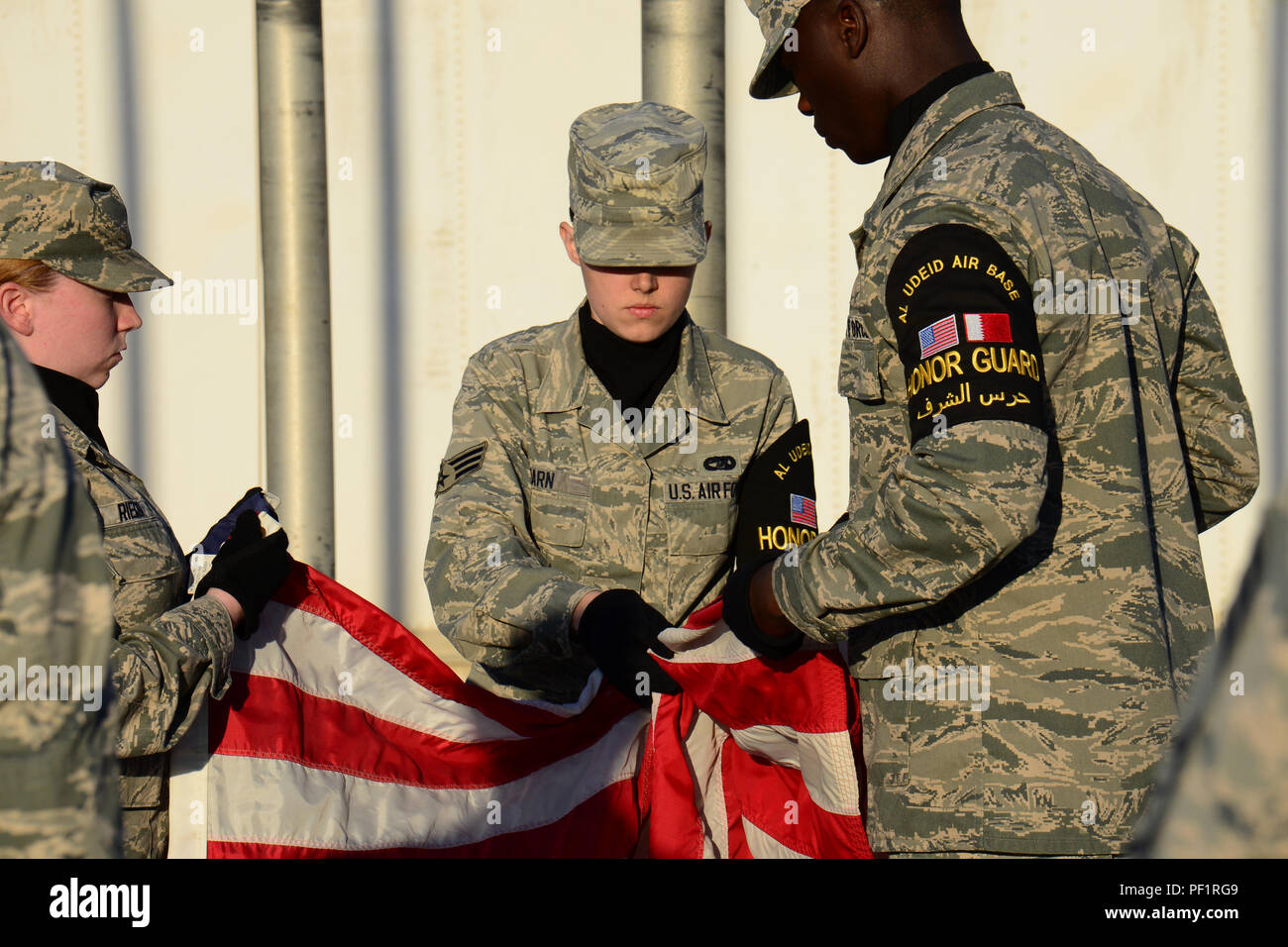 Lowering raising american flag hi-res stock photography and images - Alamy