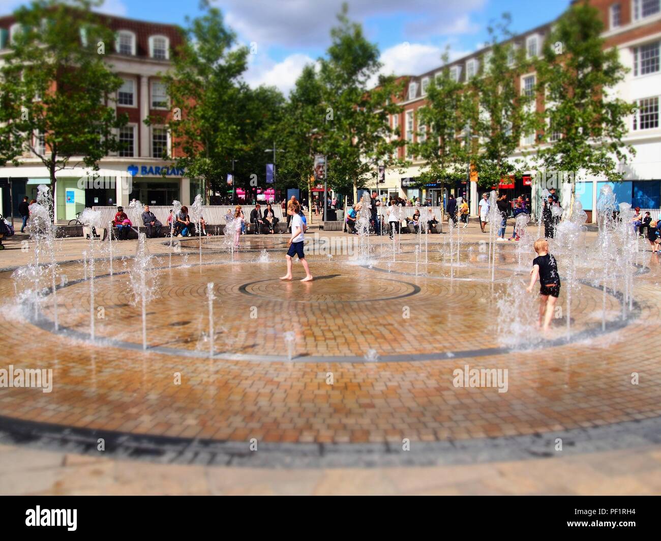 Children playing in the Fountains, Queen Victoria Square, Kingston upon ...