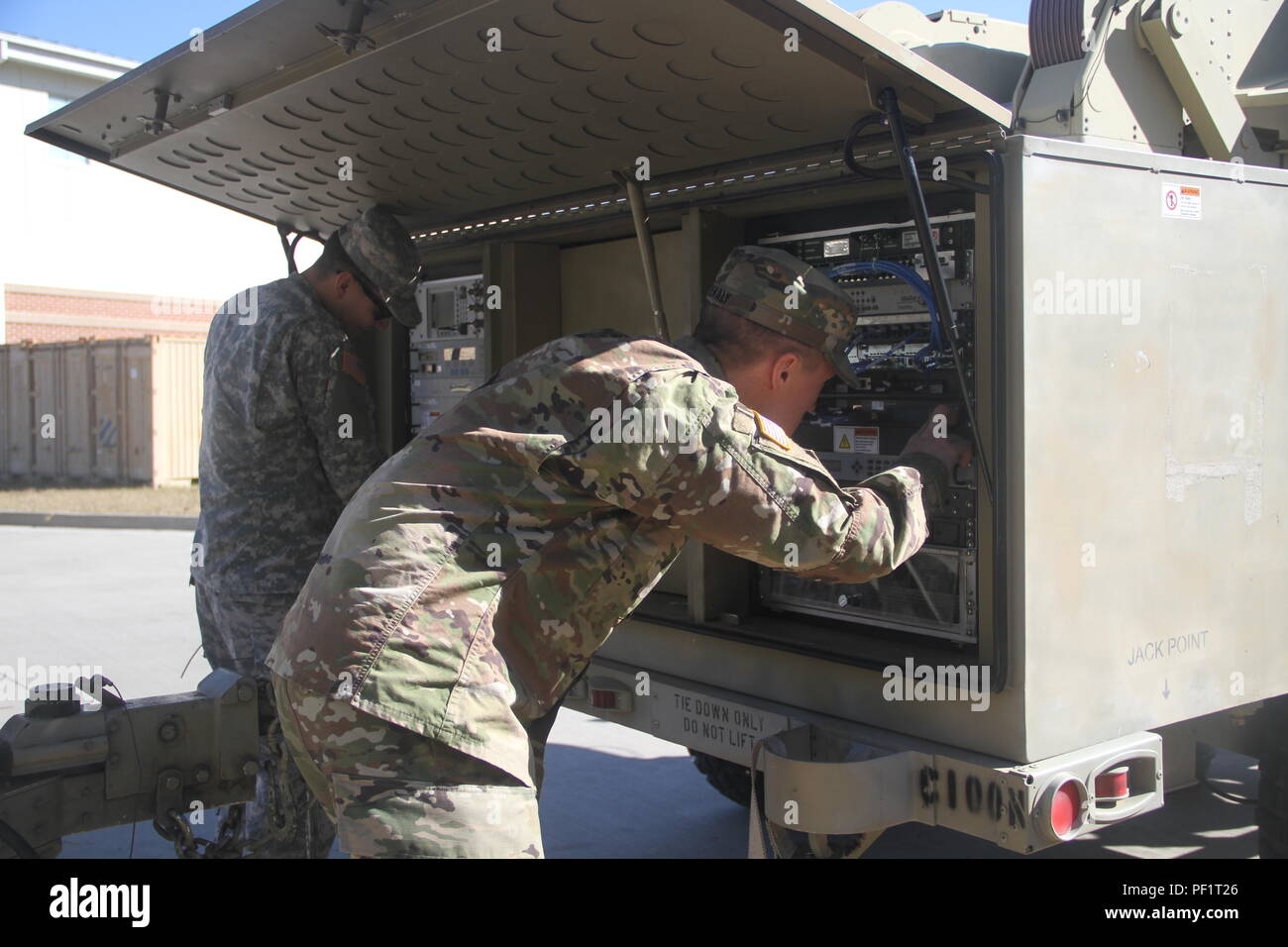 Spc. Brandon McClure (left), a Command Post Node operator and Sgt ...