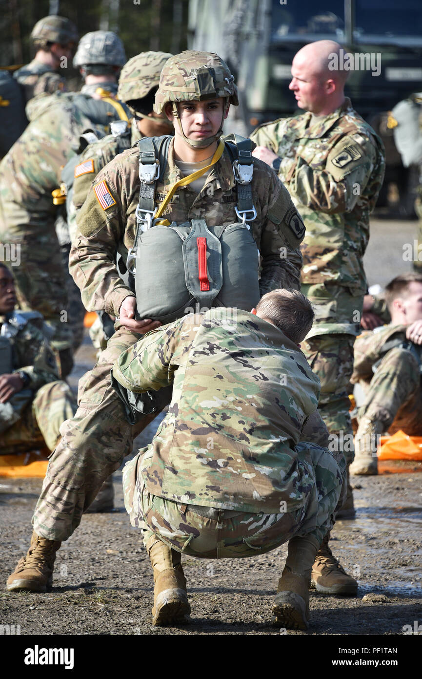 U.S. Army paratroopers, assigned to 4th Battalion, 319th Airborne Field Artillery Regiment ...