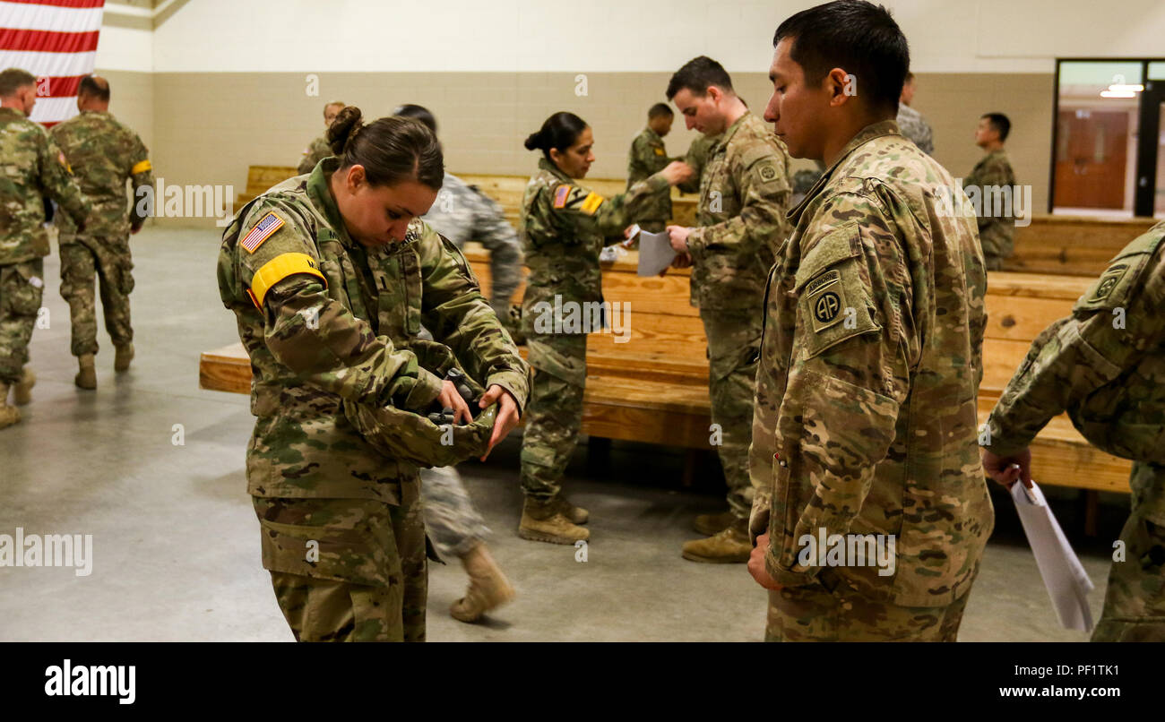 First Lt. Katie Muller, a jumpmaster assigned to the 407th Brigade ...