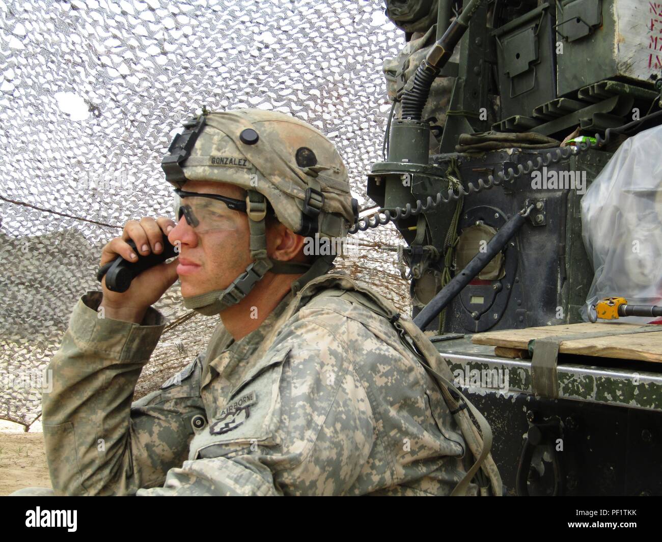 U.S. Army Alaska ammo team chiefs monitor radio communications while ...