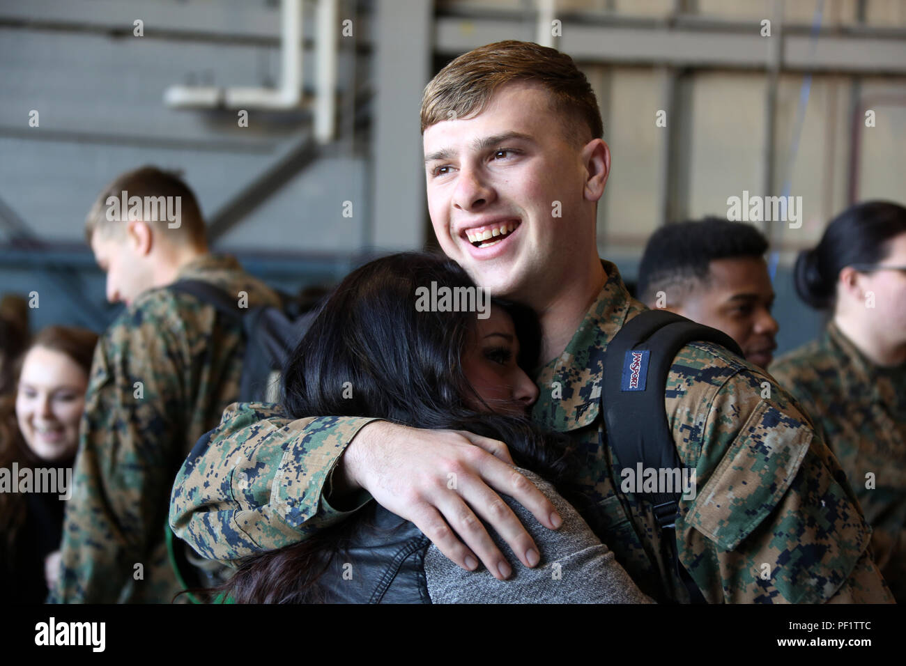 Abigail Rudolph, left, embraces Lance Cpl. Trenten Rudolph during a ...