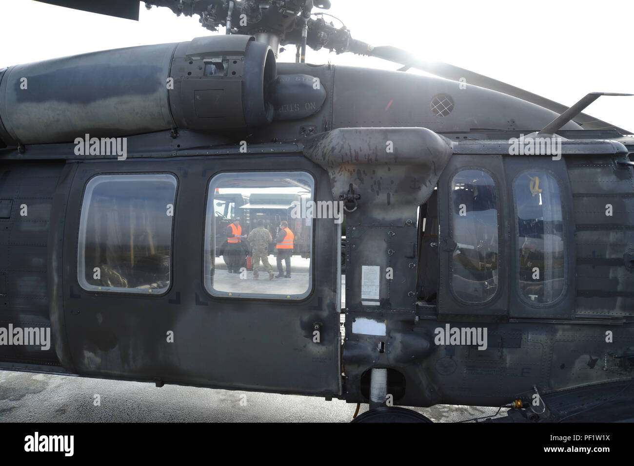A petroleum supply specialist from U.S. Army 12th Combat Aviation Brigade prepares a UH-60 Black ...