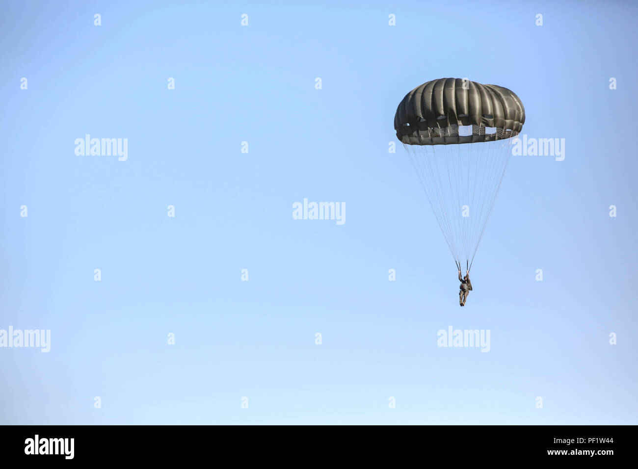 A Marine with 2nd Reconnaissance Battalion descends over Camp Lejeune ...